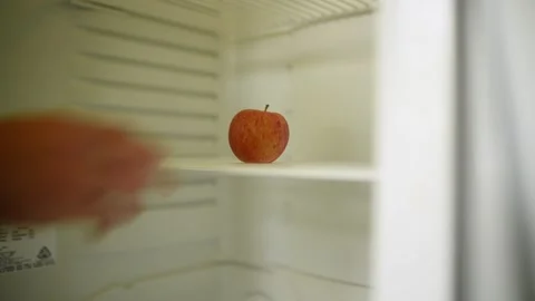 Person reaching inside empty fridge taki... | Stock Video | Pond5