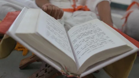 Person reading the Vedas at Pashupatinat... | Stock Video | Pond5