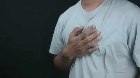 Person suffering from chest pain and har... | Stock Video | Pond5