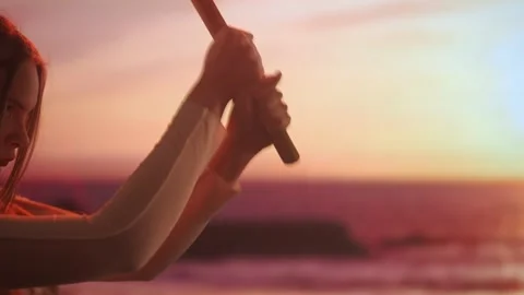 Person with sword posing at camera. Youn... | Stock Video | Pond5