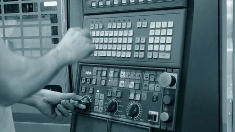 Person works behind the control panel of... | Stock Video | Pond5
