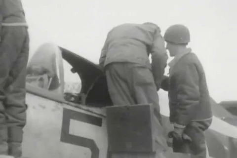 Personnel work on plane and men talk in ... | Stock Video | Pond5