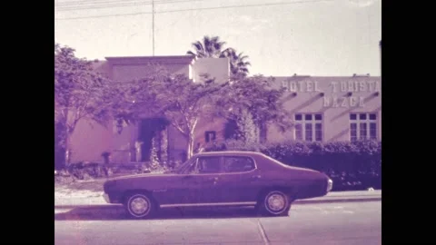 Peru 1975, Cars parked outside the facad... | Stock Video | Pond5