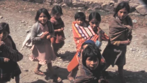 Peru - 1979: Poor children on the street... | Stock Video | Pond5