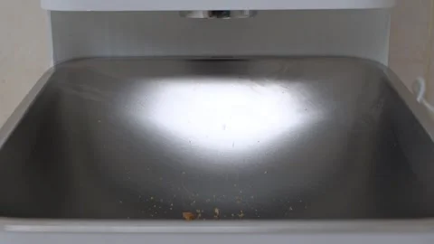 Pet food falling from white container in... | Stock Video | Pond5