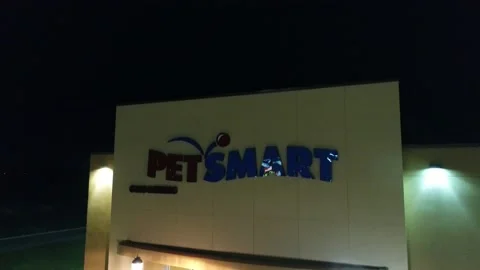 Pet Smart Store Logo Aerial At Night Des... | Stock Video | Pond5