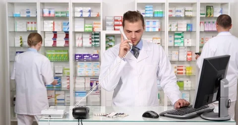 Pharmacists Team Work Busy Pharmacy Stor... | Stock Video | Pond5