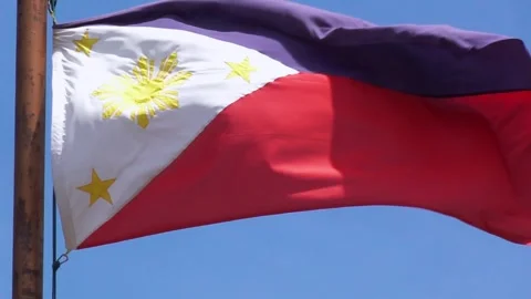 Philippine flag flying proudly in the wi... | Stock Video | Pond5