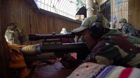 Philippine sniper looking at his target ... | Stock Video | Pond5