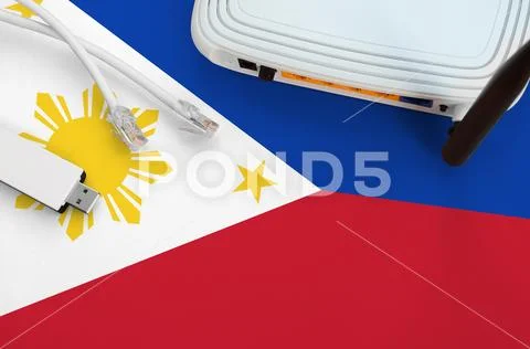 Philippines flag depicted on table with internet rj45 cable, wireless ...