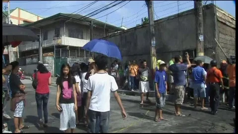 PHILIPPINES: Six dead and thousands home... | Stock Video | Pond5