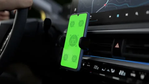 A phone mounted on a car dashboard with... | Stock Video | Pond5