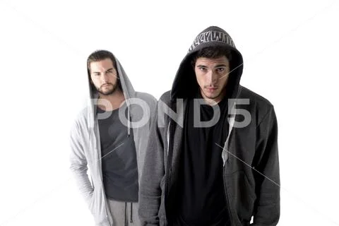 Photograph: Photo of two men posing together against a blank backdrop ...