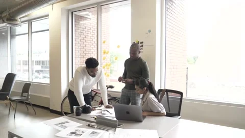 Photographer and creatives planning desi... | Stock Video | Pond5