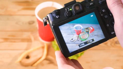 photographer take a photo with coffee in... | Stock Video | Pond5