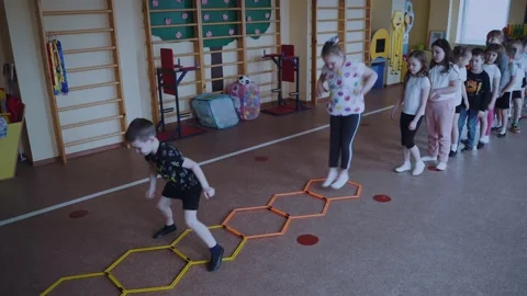 Physical education in kindergarten, a gr... | Stock Video | Pond5