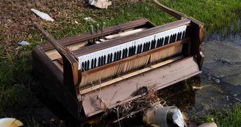 Piano in ditch washed out of destroyed h... | Stock Video | Pond5