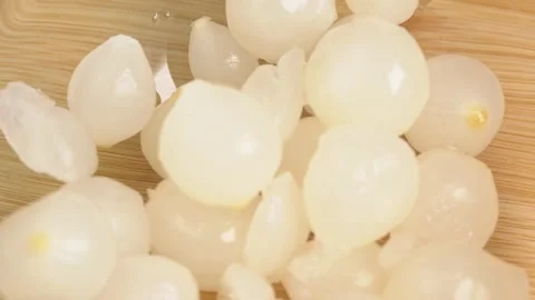 Pickled marinated mini pearl onions pour... | Stock Video | Pond5