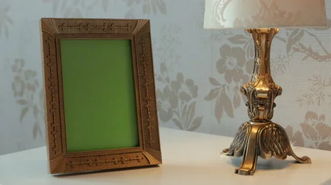 Picture Frame with Green Screen on bed t... | Stock Video | Pond5