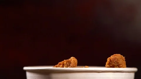 Fried Chicken Falling Stock Footage ~ Royalty Free Stock Videos | Pond5
