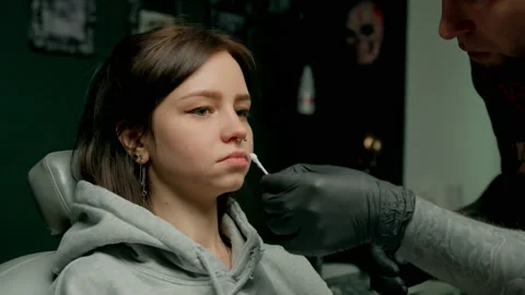 Piercing studio interior - piercing mast... | Stock Video | Pond5