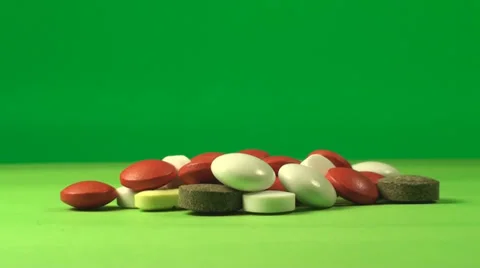 A Pile Of Pills On A Green Screen, Chrom... | Stock Video | Pond5