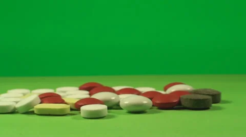 A Pile Of Pills On A Green Screen, Chrom... | Stock Video | Pond5