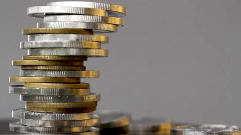 Pile of rotating silver and gold coins | Stock Video | Pond5