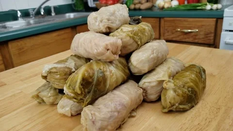 Pile of steamed or cooked meat stuffed c... | Stock Video | Pond5
