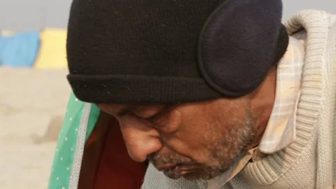 Pilgrims digging hair in the sand, Maha ... | Stock Video | Pond5