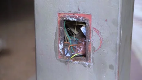 Pillar with exposed wires in run down ar... | Stock Video | Pond5