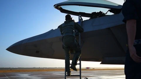Pilot boards the Lockheed Martin F-22 Ra... | Stock Video | Pond5
