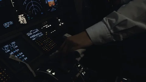 Pilot hold hand on throttle in cabin of ... | Stock Video | Pond5