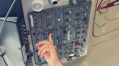 Pilot inside a jet cockpit starting up l... | Stock Video | Pond5