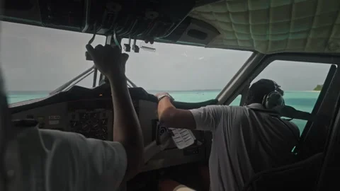 Pilot looking out of window at seaplane ... | Stock Video | Pond5
