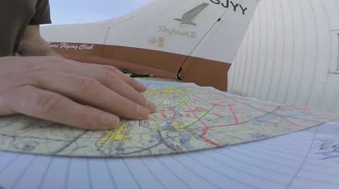 Pilot Maps Stock Footage ~ Royalty Free Stock Videos | Pond5