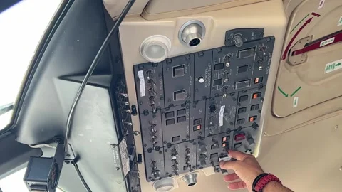 Pilot performing the preflight checks in... | Stock Video | Pond5