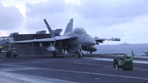 Pilots checks wing flaps of F/-18 Hornet... | Stock Video | Pond5