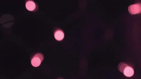 Pink flashing lights on black background... | Stock Video | Pond5