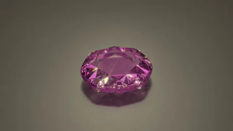 Pink gemstone is rotating 3D render seam... | Stock Video | Pond5