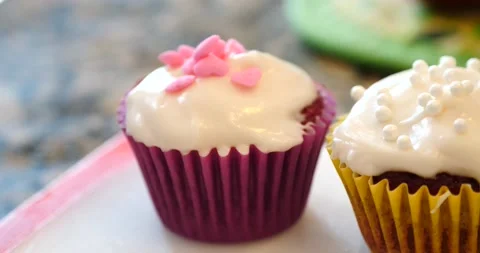 Pink heart sprinkles falling on red velv... | Stock Video | Pond5