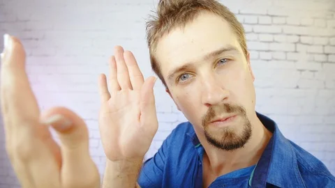 Pissed off angry man hands clapping into... | Stock Video | Pond5