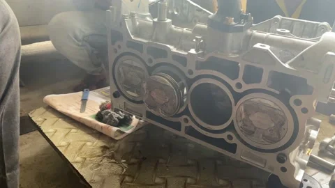 Piston fixing in engine block | Stock Video | Pond5