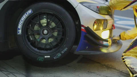 Pit Crew Mechanic at Car Racing in Pit S... | Stock Video | Pond5