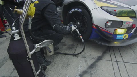 Car Racing Pit Stop Stock Video Footage | Royalty Free Car Racing Pit ...