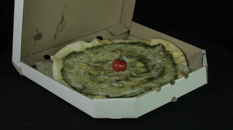 Pizza in box rotates on a black backgrou... | Stock Video | Pond5