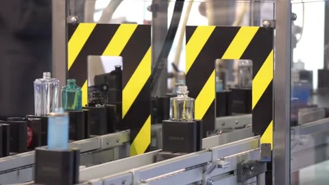 PKB EKO PERFUME filling and capping mach... | Stock Video | Pond5