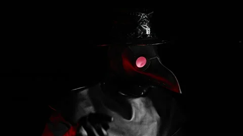Plague doctor with crow-like mask disapp... | Stock Video | Pond5