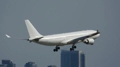Plain white passenger plane with no logo... | Stock Video | Pond5