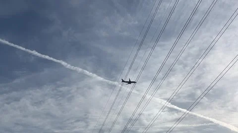 Plane Flying Passing Light Rail Bridge a... | Stock Video | Pond5
